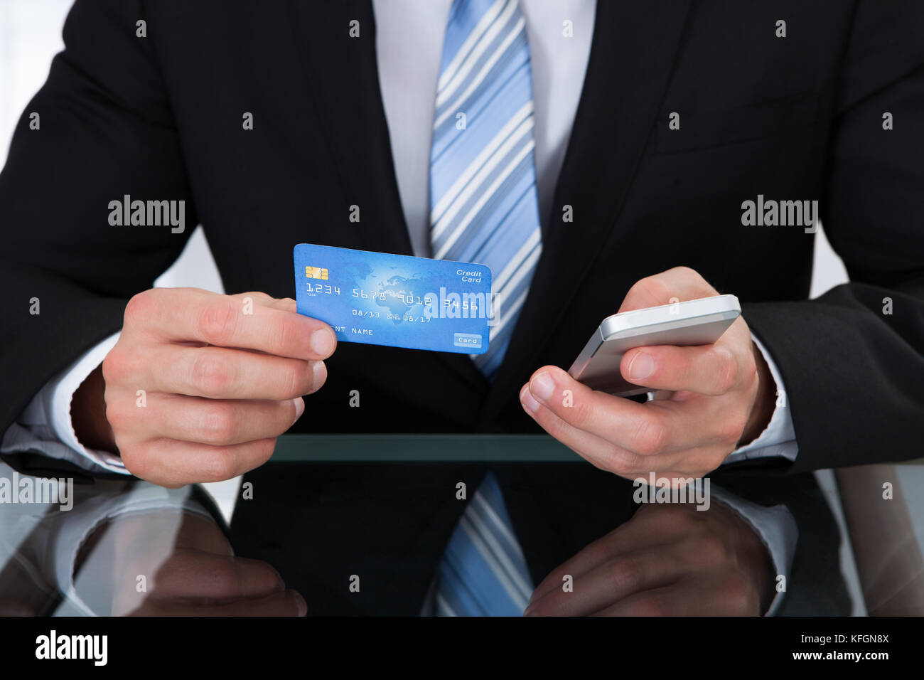 Making online payment their credit card hi-res stock photography and ...