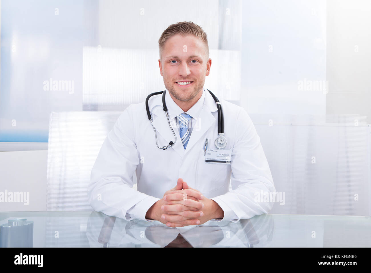 Doctor seated hi-res stock photography and images - Alamy