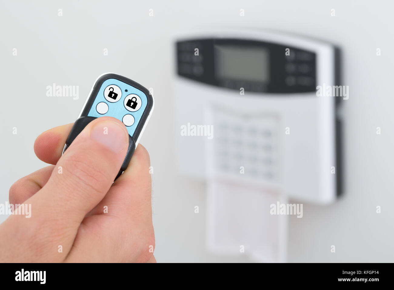 Person using remote control hi-res stock photography and images - Alamy