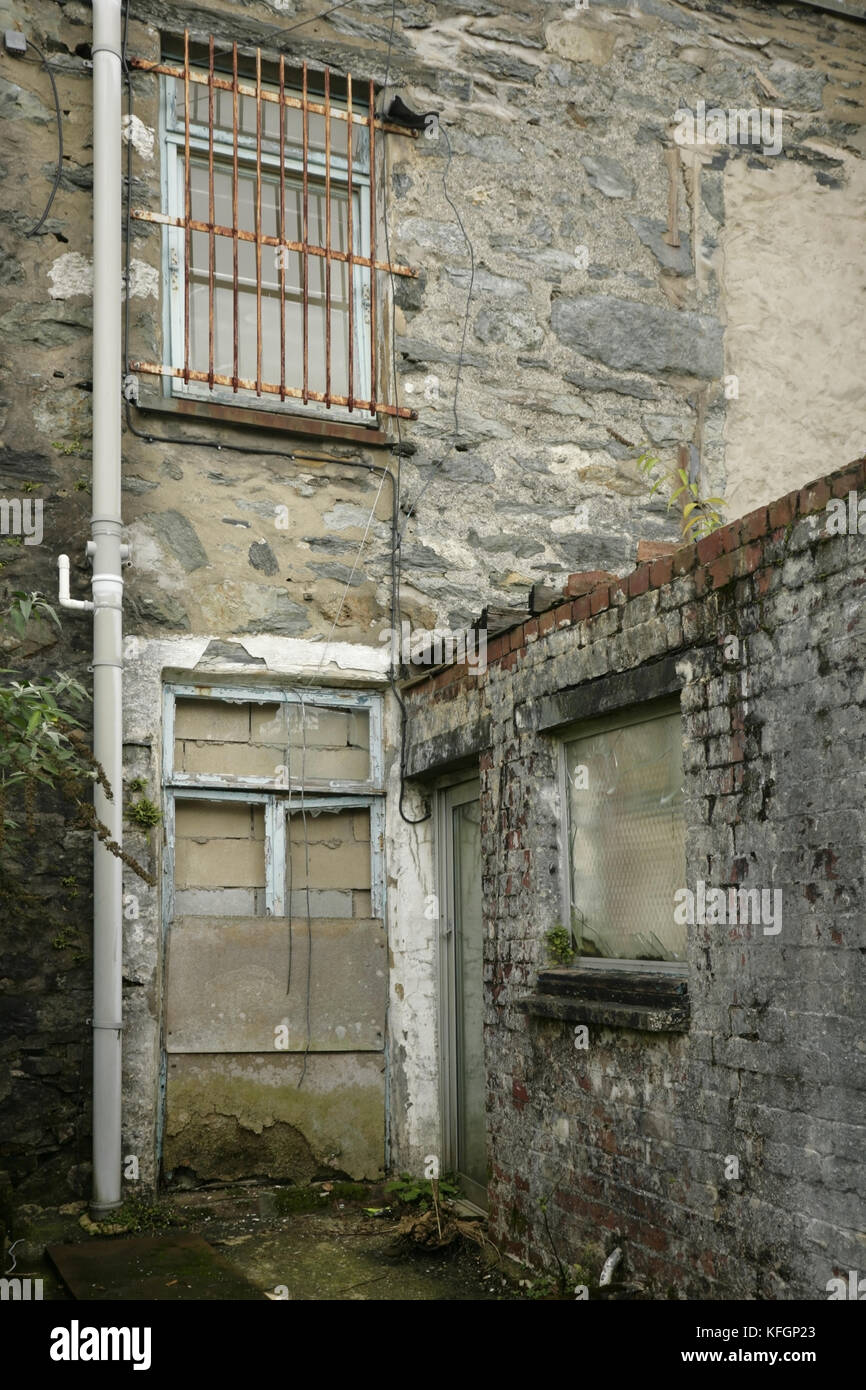 Rear of derelict stone terraced house Stock Photo - Alamy