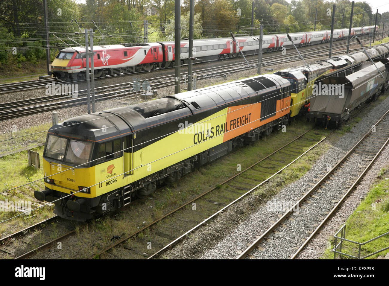 Virgin Trains East Coast class 91 electric loco passing Colas Rail ...