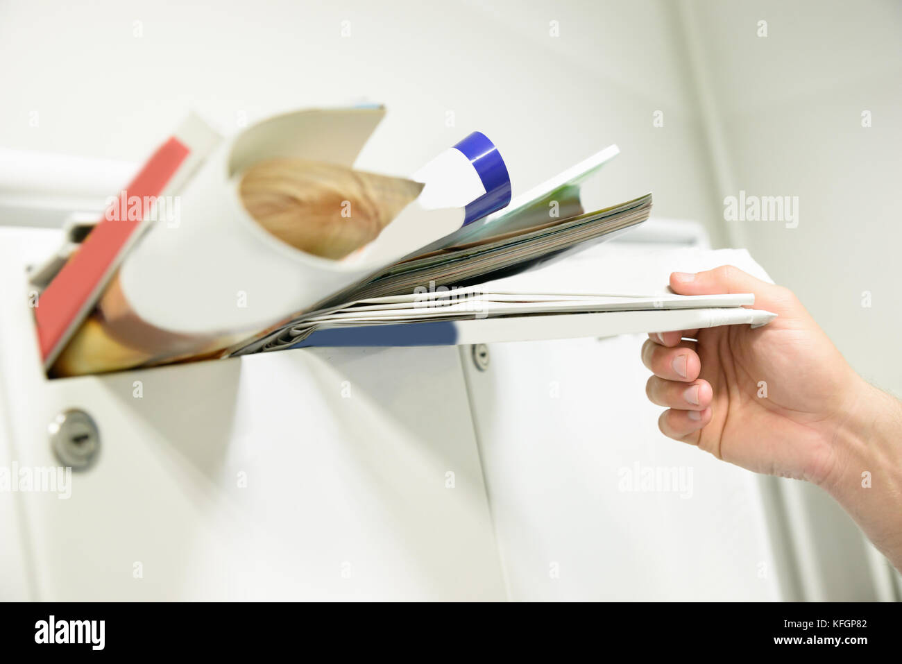 Close-up Of Person's Hand Taking Documents From Mailbox Stock Photo - Alamy
