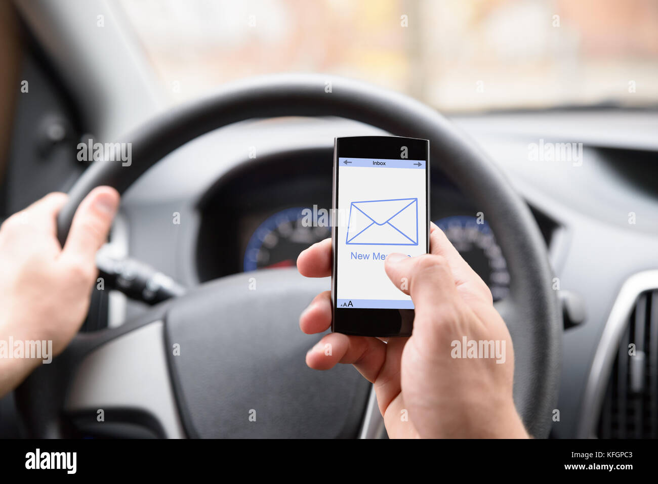 Man Holding Cellphone With Message Notification While Driving Car Stock ...