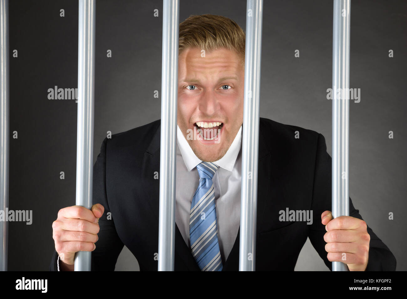 Man behind bars hi-res stock photography and images - Alamy