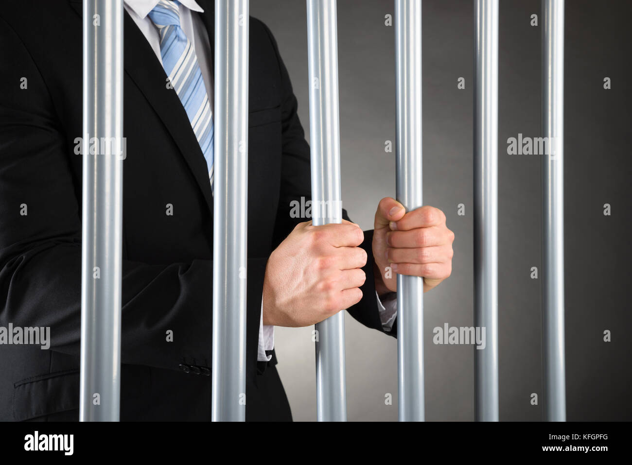 Criminal behind bars in jail hi-res stock photography and images - Alamy