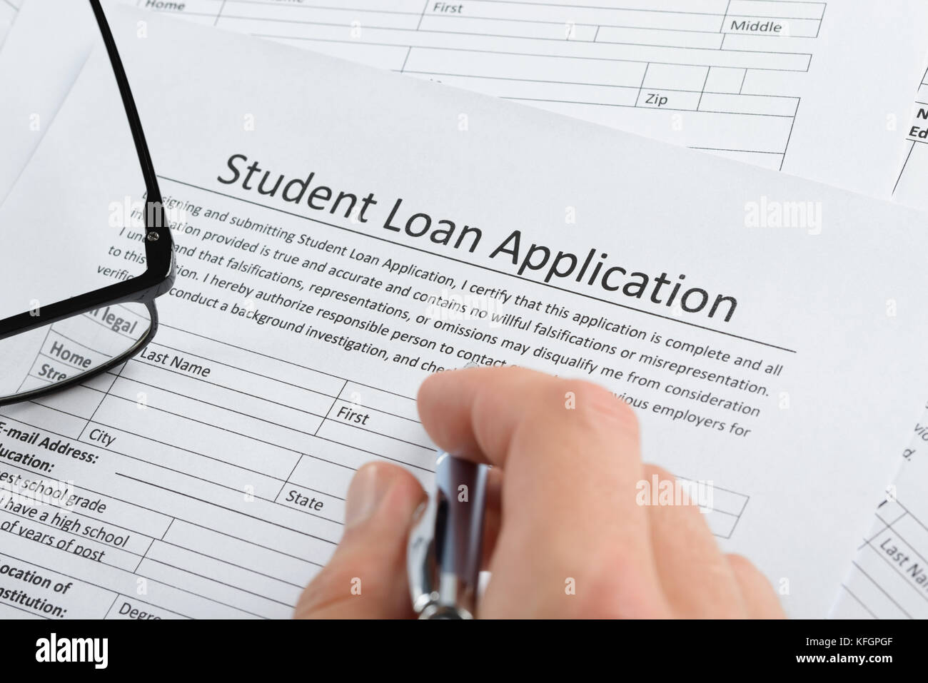 Student filling application form hi-res stock photography and images ...
