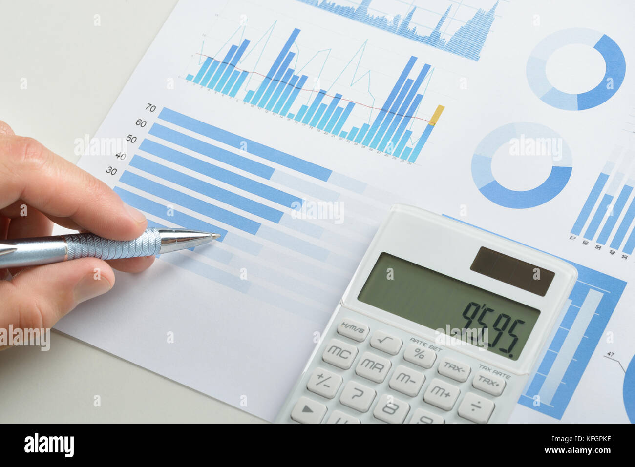 Business man doing calculations hi-res stock photography and images - Alamy
