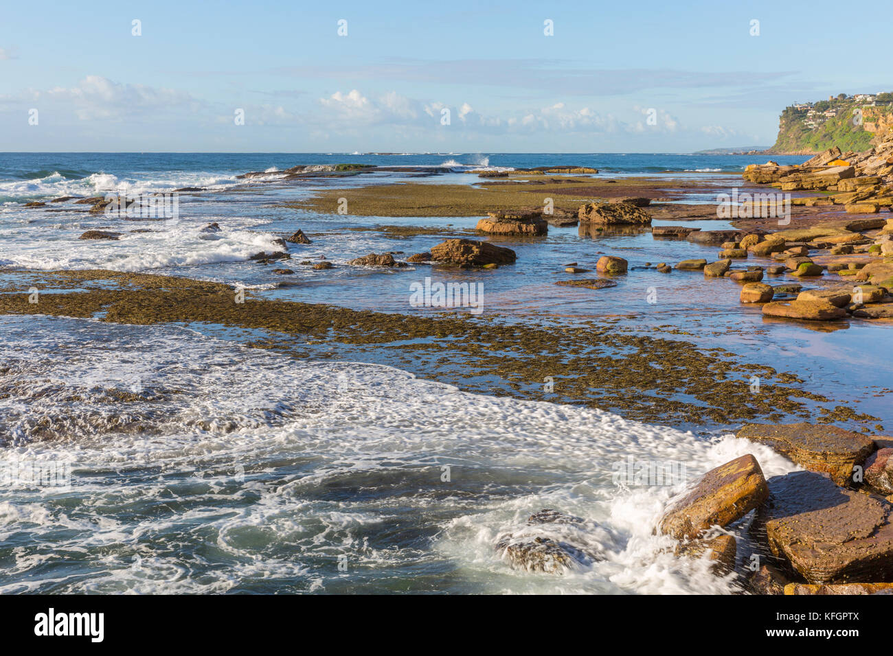 Rugged coastline at southern end of Bilgola beach on Sydney northern ...