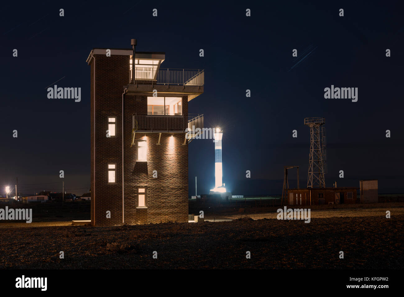 Converted lookout tower on Dungeness beach with lighthouse Stock Photo ...