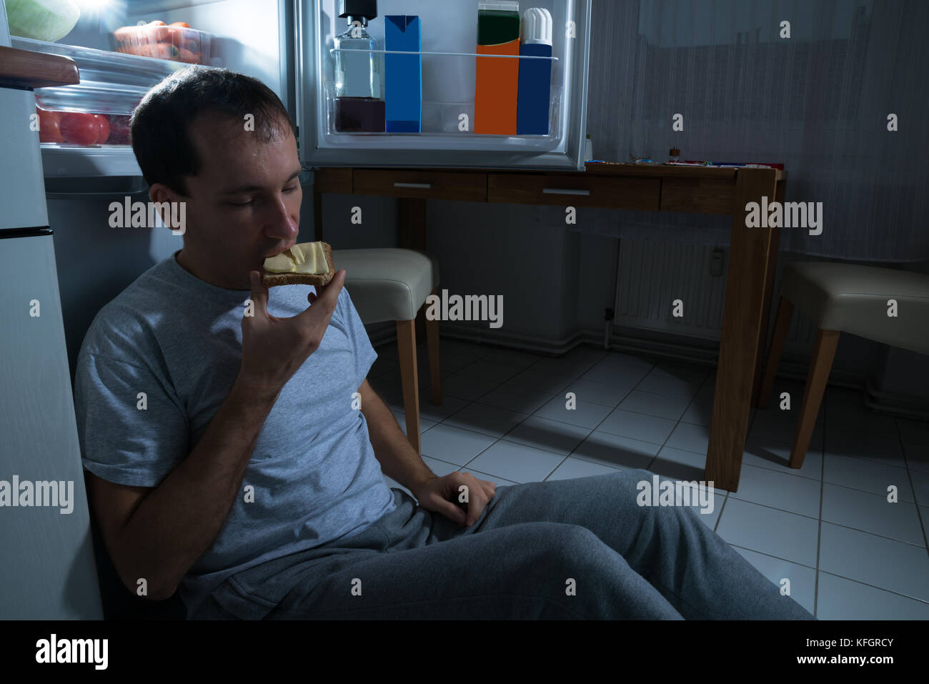 Man eating cheese hi-res stock photography and images - Alamy