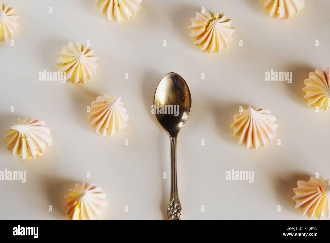 A lot of yellow meringue, and teaspoon Stock Photo - Alamy