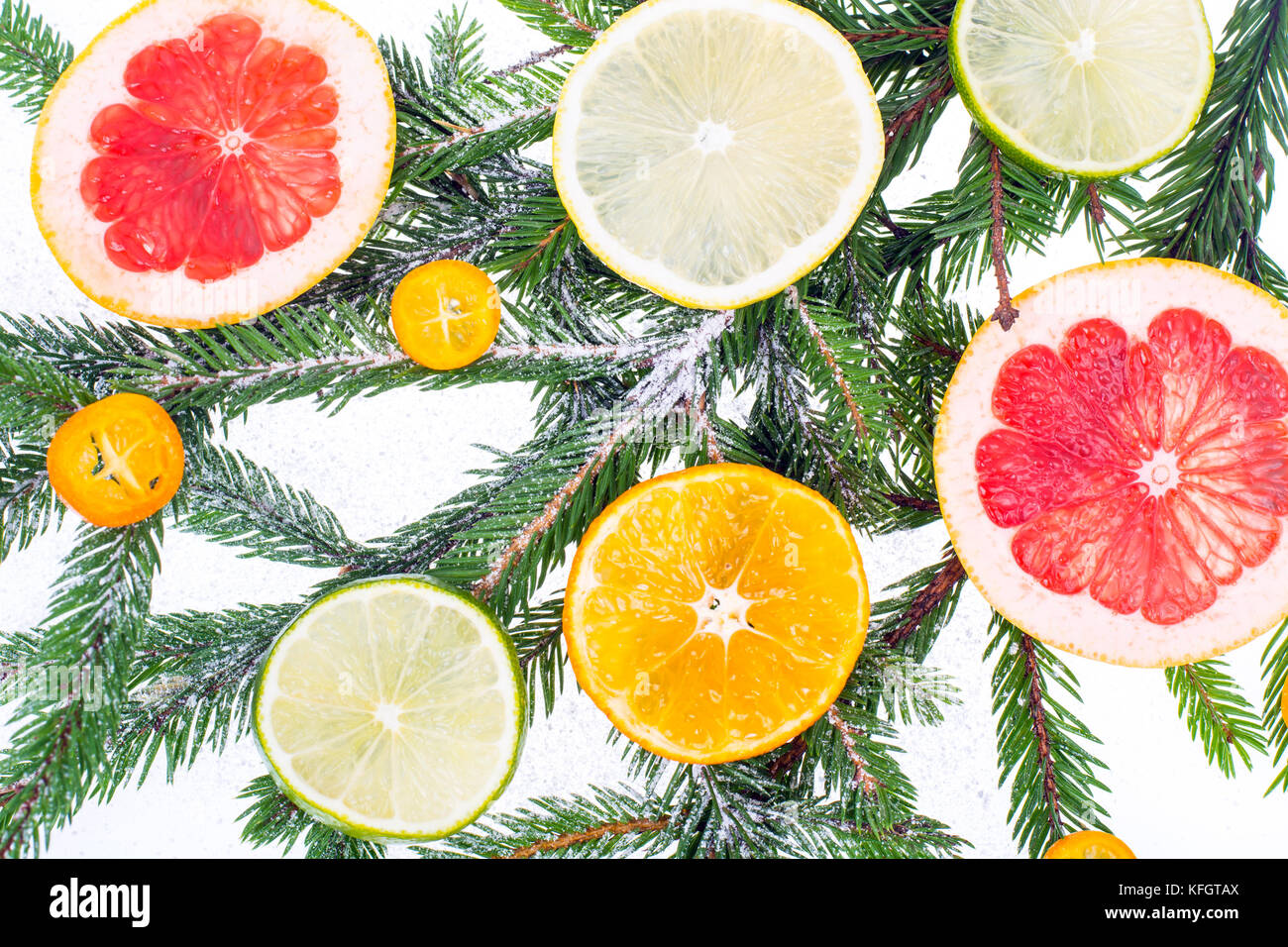 New Year and Christmas branch of spruce, decorated with fruits Stock ...