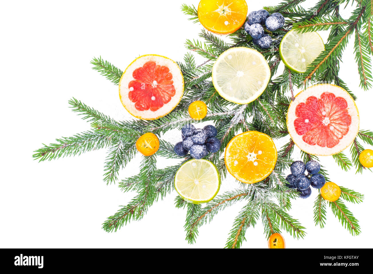 New Year and Christmas branch of spruce, decorated with fruits Stock ...