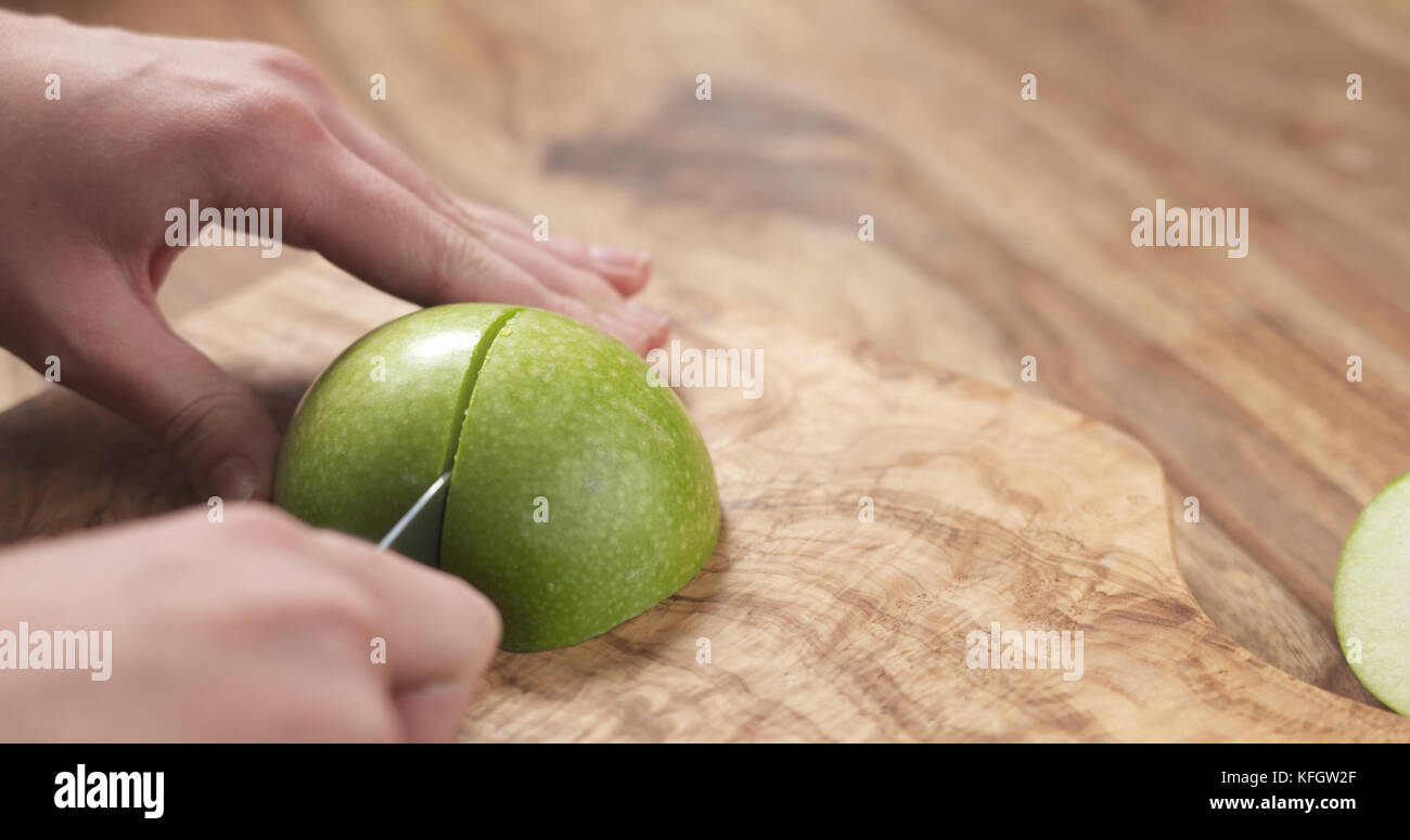 Apple cut into quarters hi-res stock photography and images - Alamy
