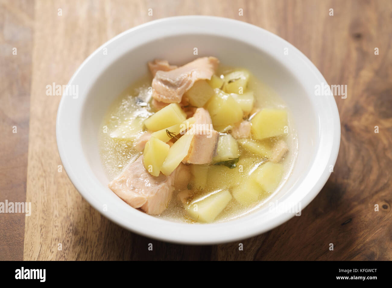 closeup pour fish soup with trout into bowl, shallow focus Stock Photo ...