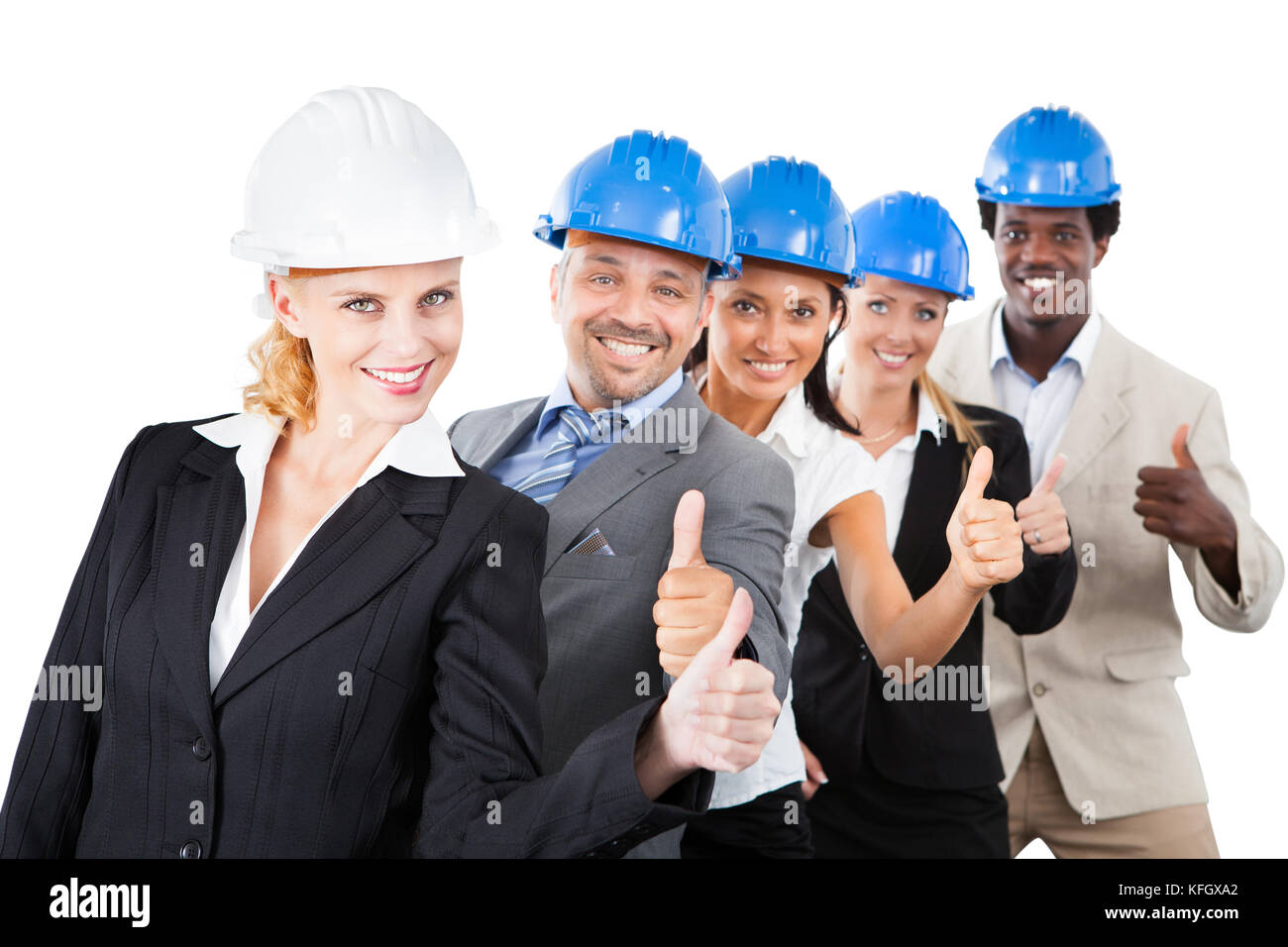 Portrait of multiethnic architects wearing hardhats while gesturing ...
