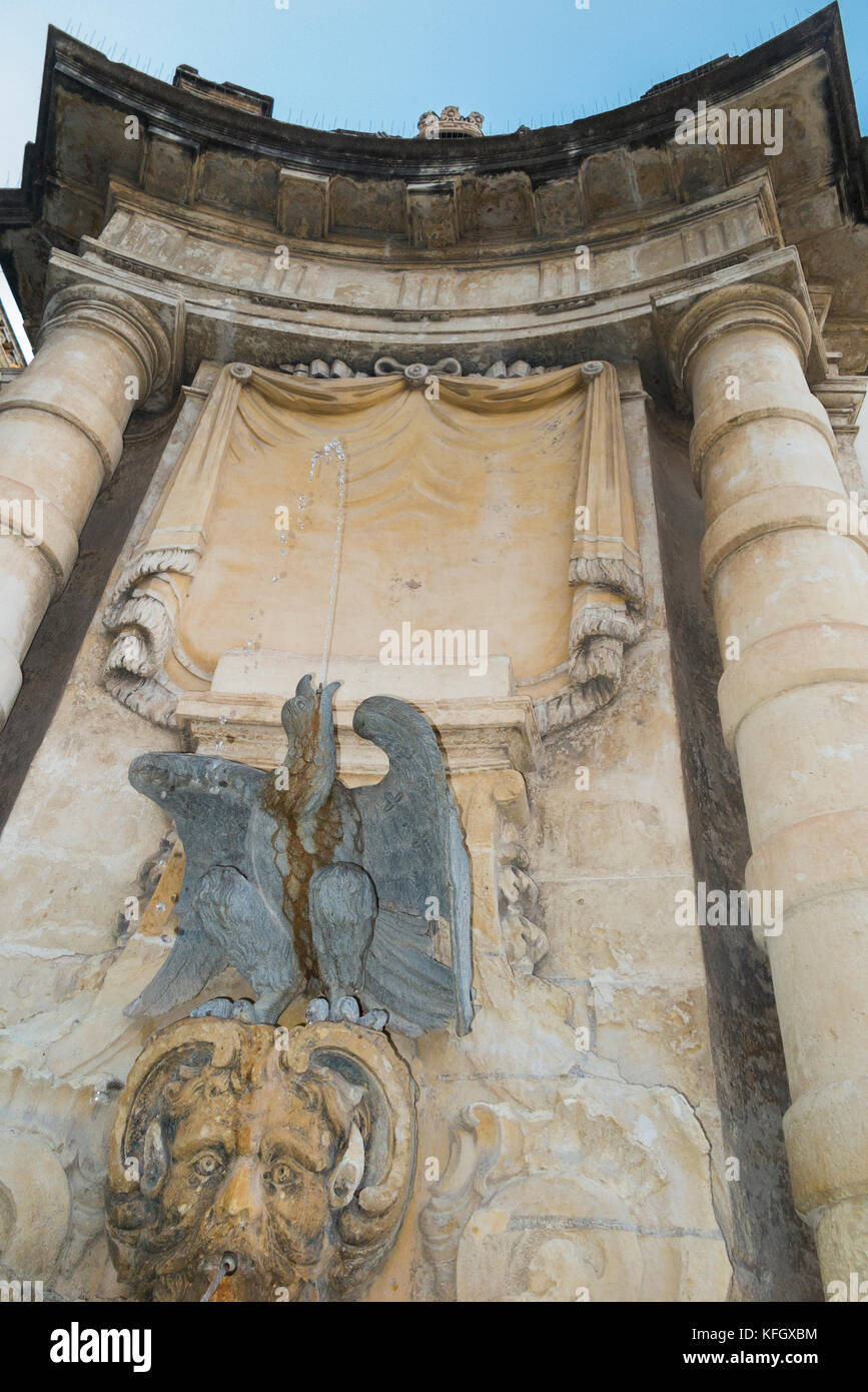 Water feature / waterfall / water fountain in stone at one corner of ...