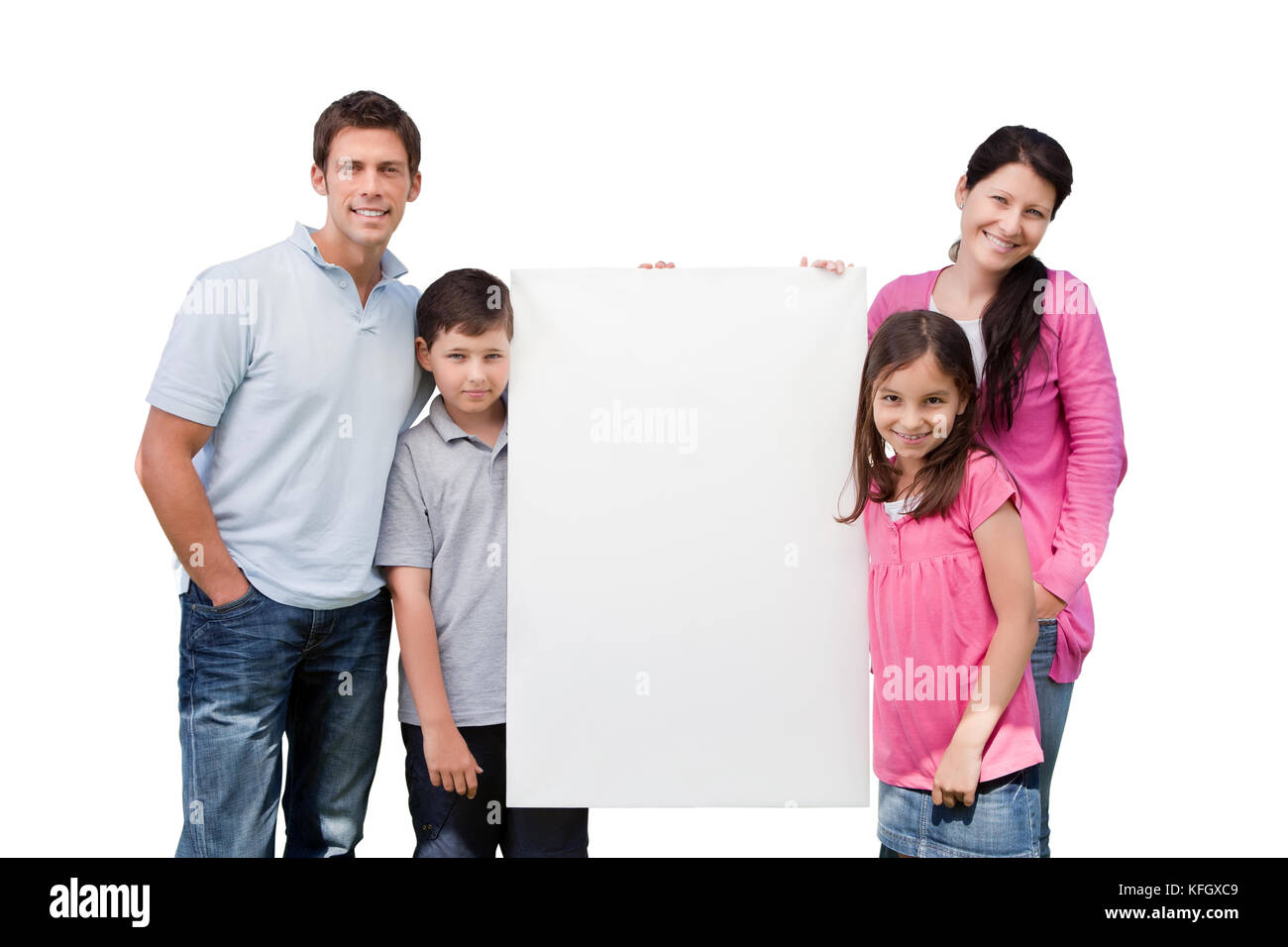 Portrait of happy family holding blank billboard isolated over white ...