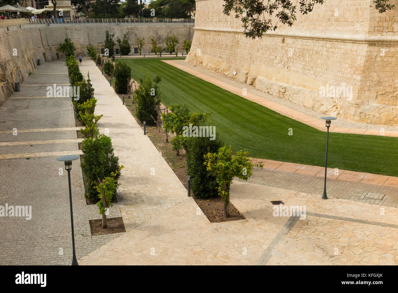 The Mdina Ditch Garden with well cared for perfect lawn grass and which ...