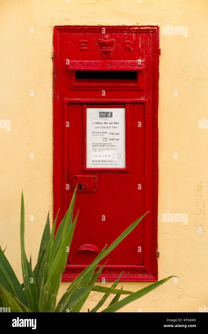 Wall mounted letterbox in Mdina, Malta. The letter E R show its British ...