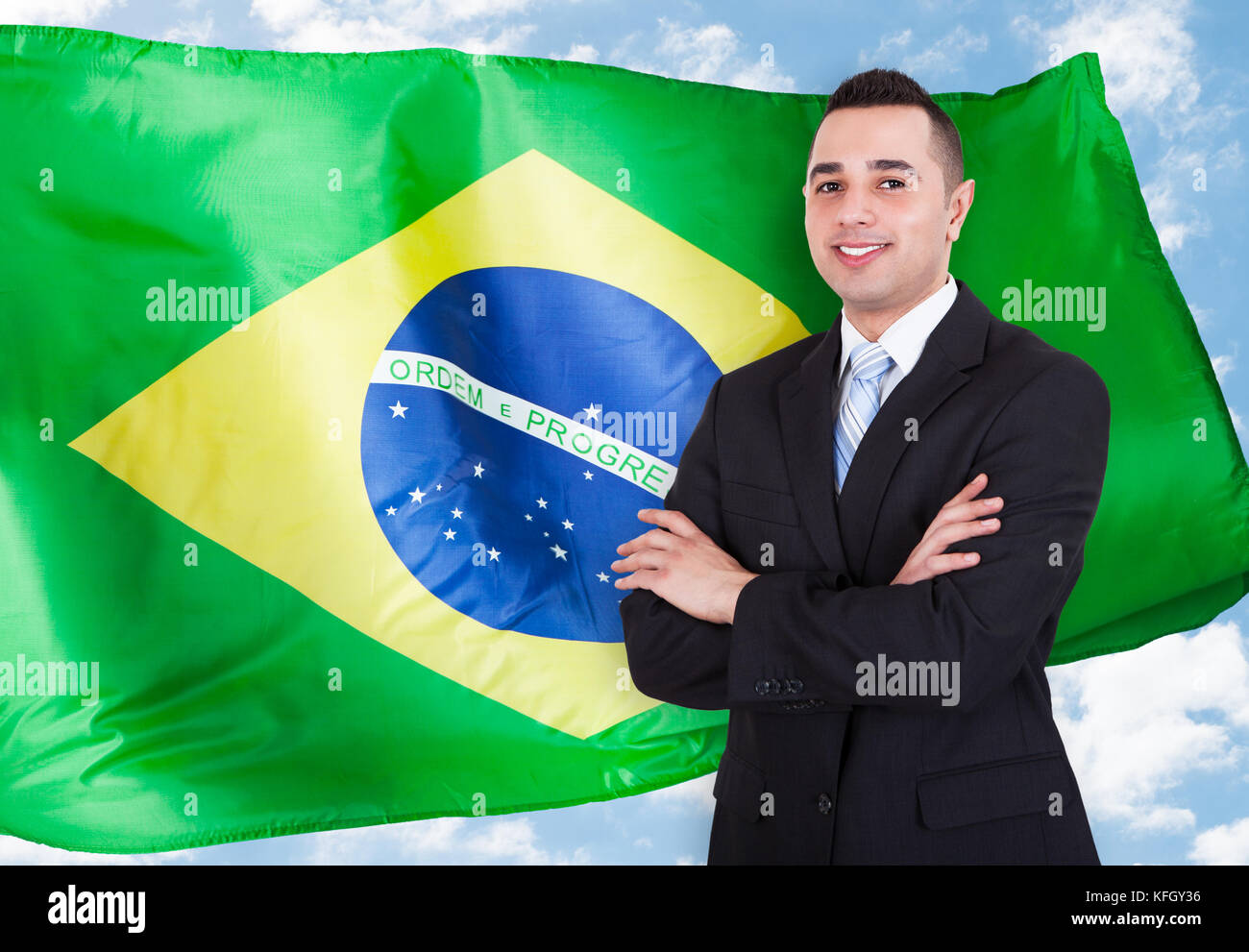 Portrait Of Young Businessman Standing In Front Of Brazilian Flag Stock ...
