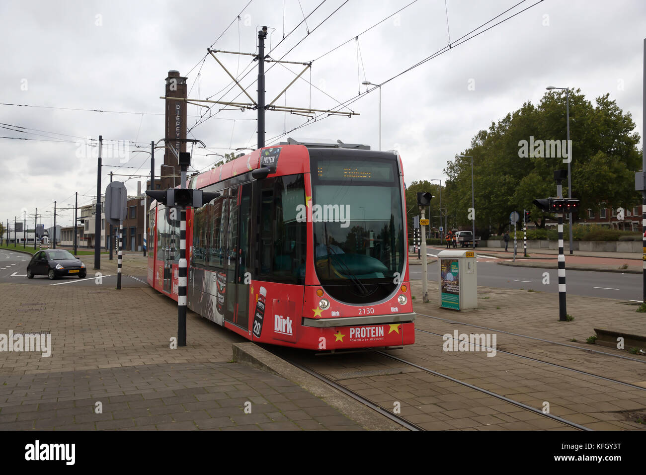 A red modern tram in Rotterdam, Holland Stock Photo - Alamy