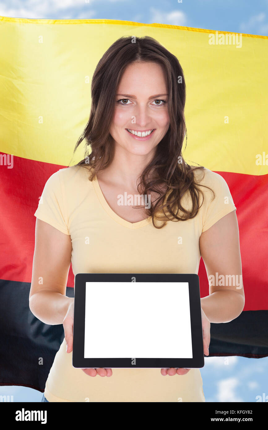 Female student holding flag hi-res stock photography and images - Alamy