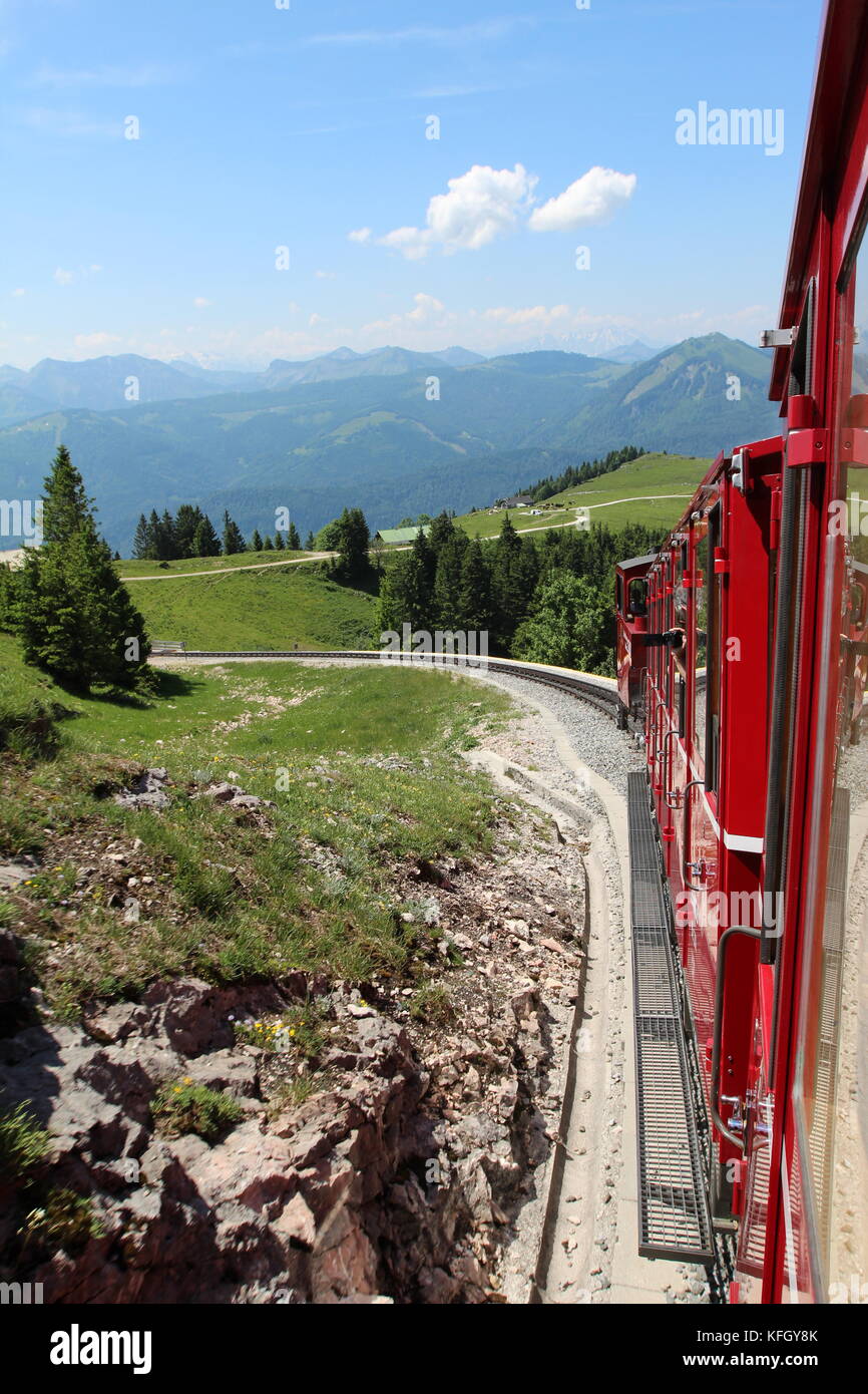 Steam locomotive of a vintage cogwheel railway going to Schafberg ...