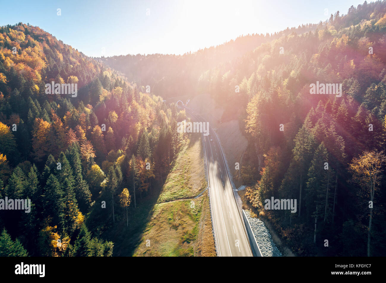 Aerial drone view of mountain overpass and modern road with tunnel ...