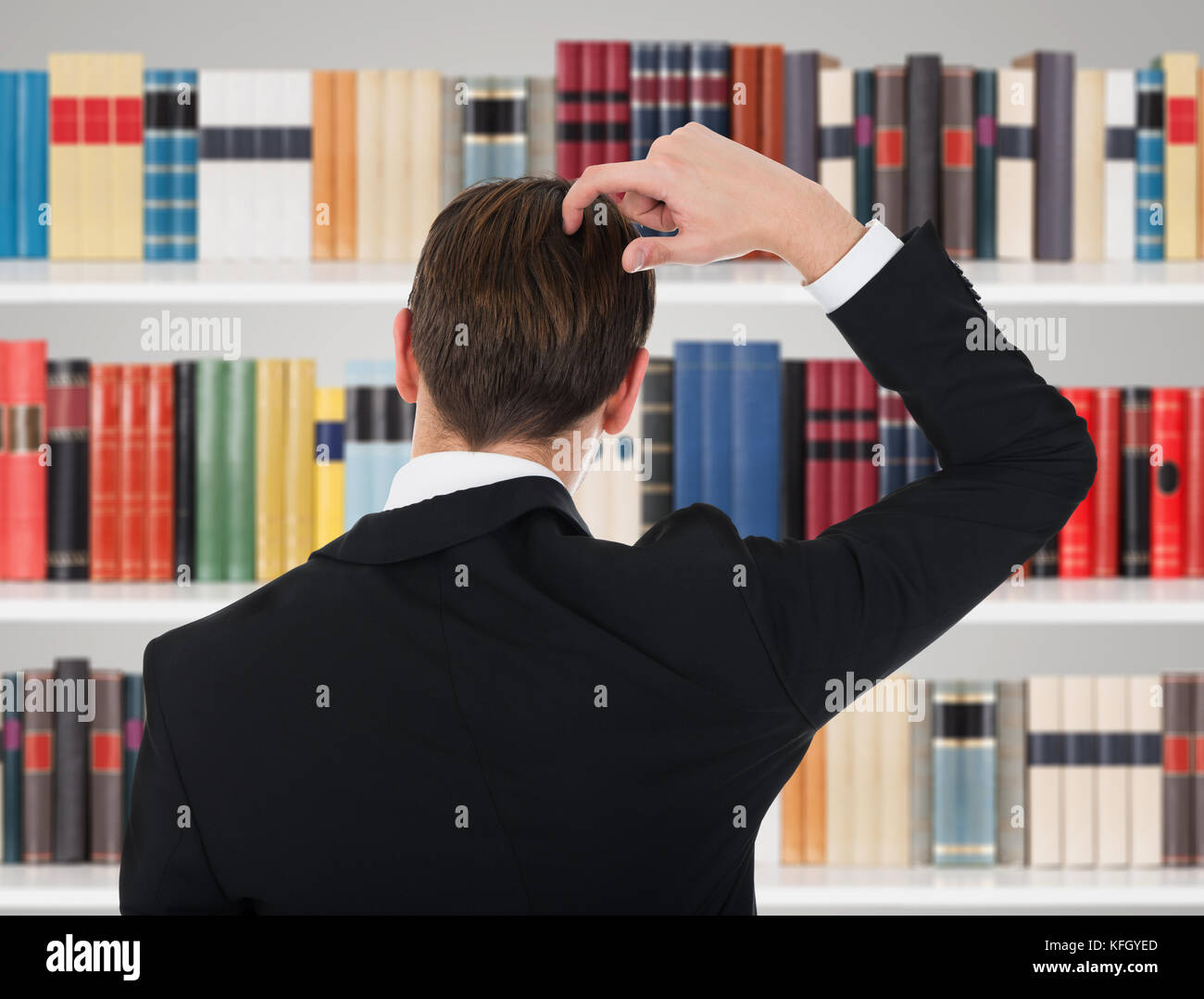 Man scratching head hi-res stock photography and images - Alamy