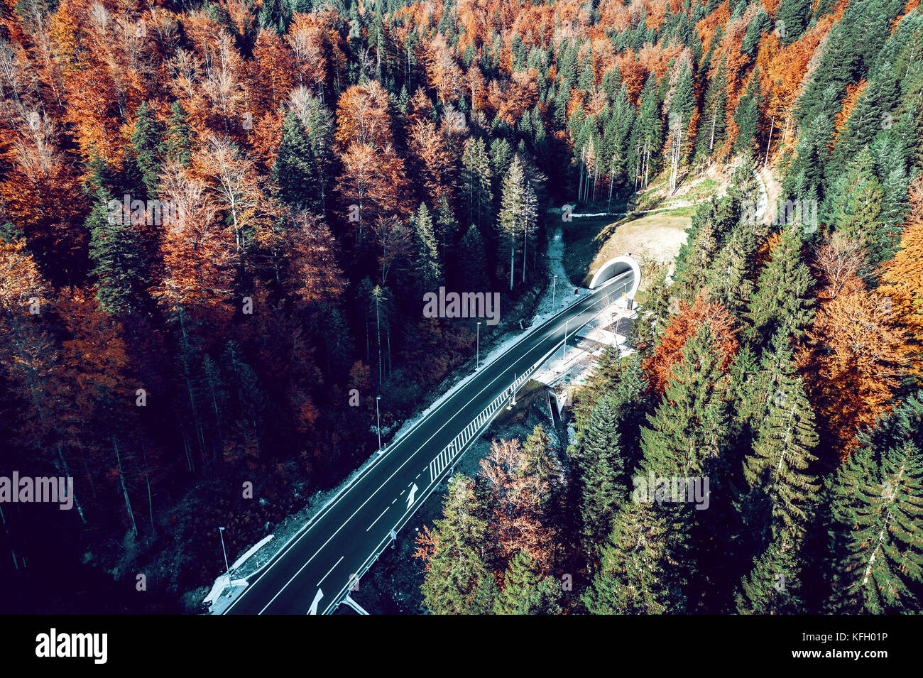 Aerial drone view of mountain overpass and modern road with tunnel ...