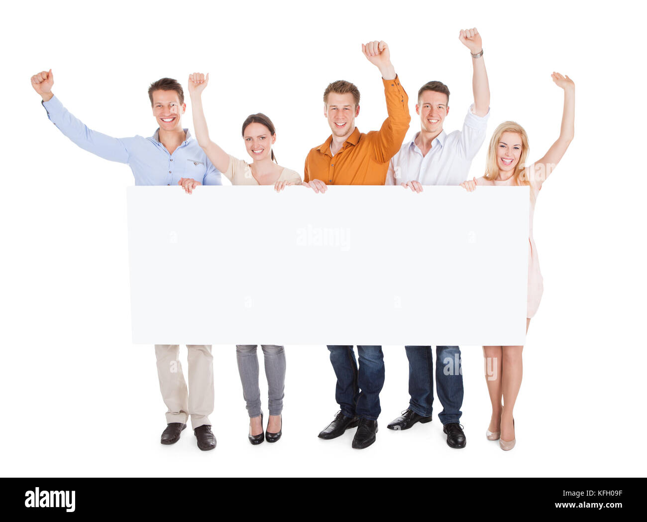 Full length portrait of excited young friends holding blank billboard ...