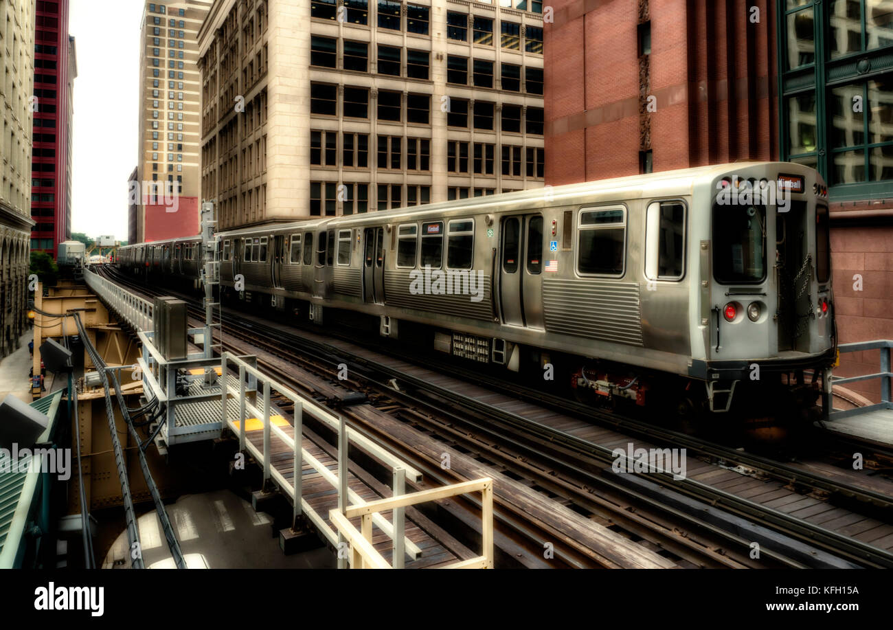 Train on elevated tracks within buildings at the Loop, Chicago City ...