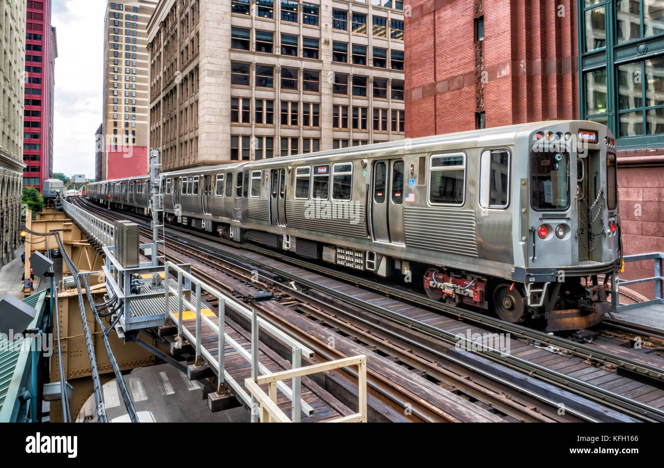Train on elevated tracks within buildings at the Loop, Chicago City ...