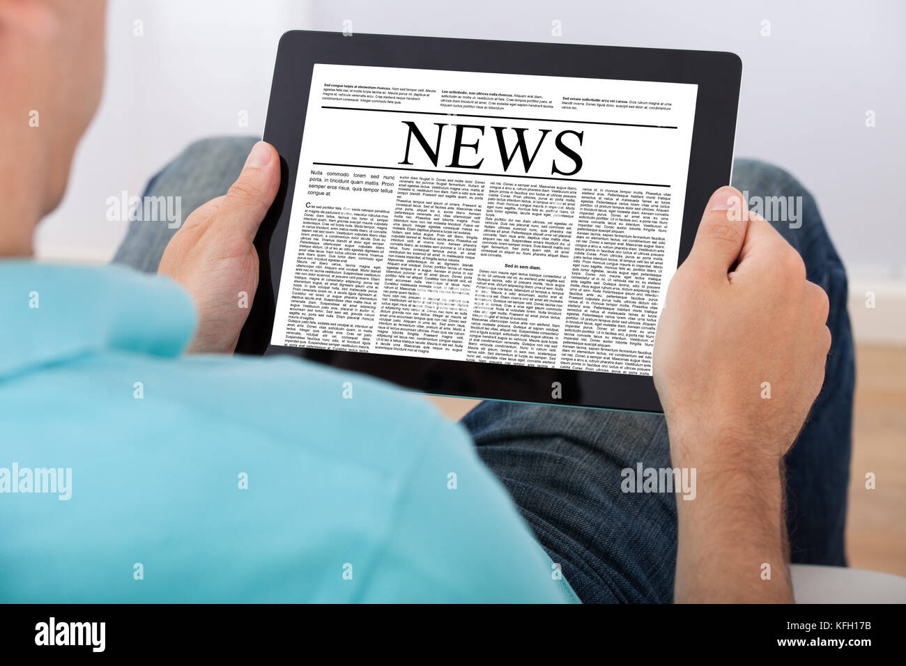 Newspaper tablet hi-res stock photography and images - Alamy