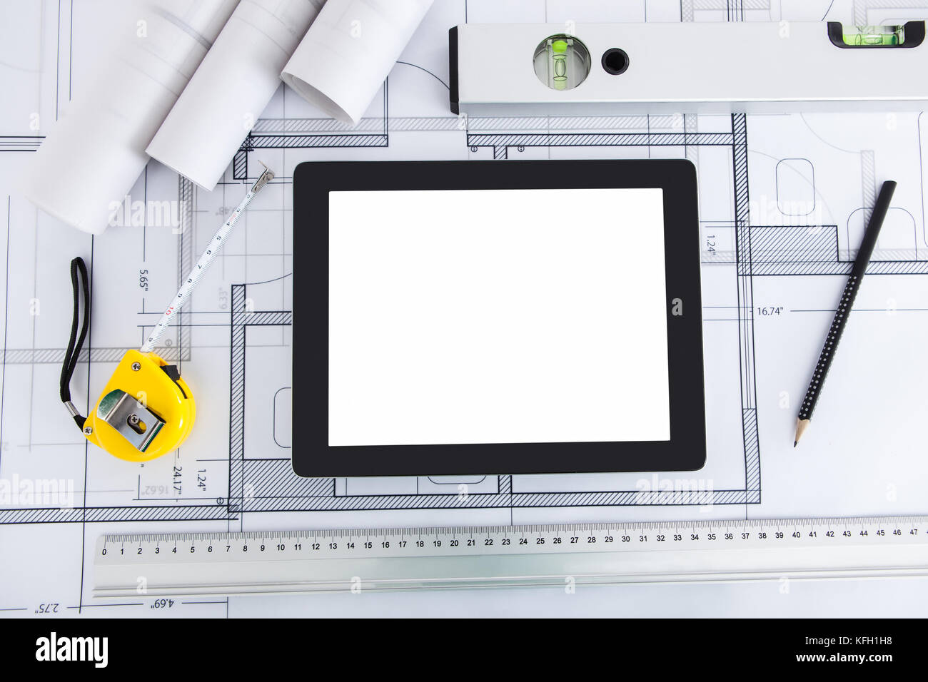 Closeup of digital tablet with architect's tools on blueprint Stock ...