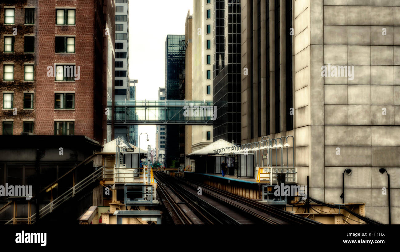 Train on elevated tracks within buildings at the Loop, Chicago City ...