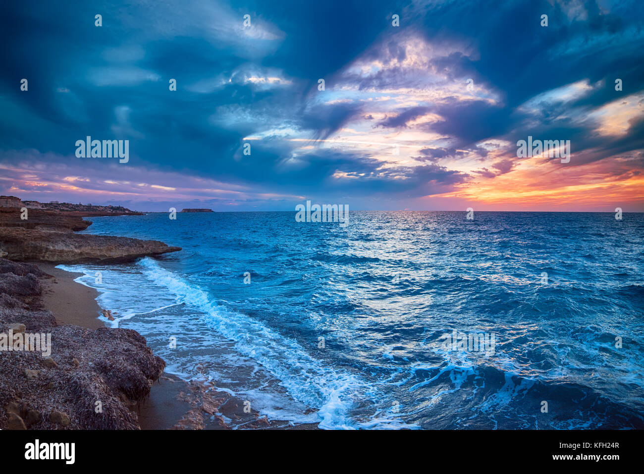 Sunset at sea Stock Photo - Alamy