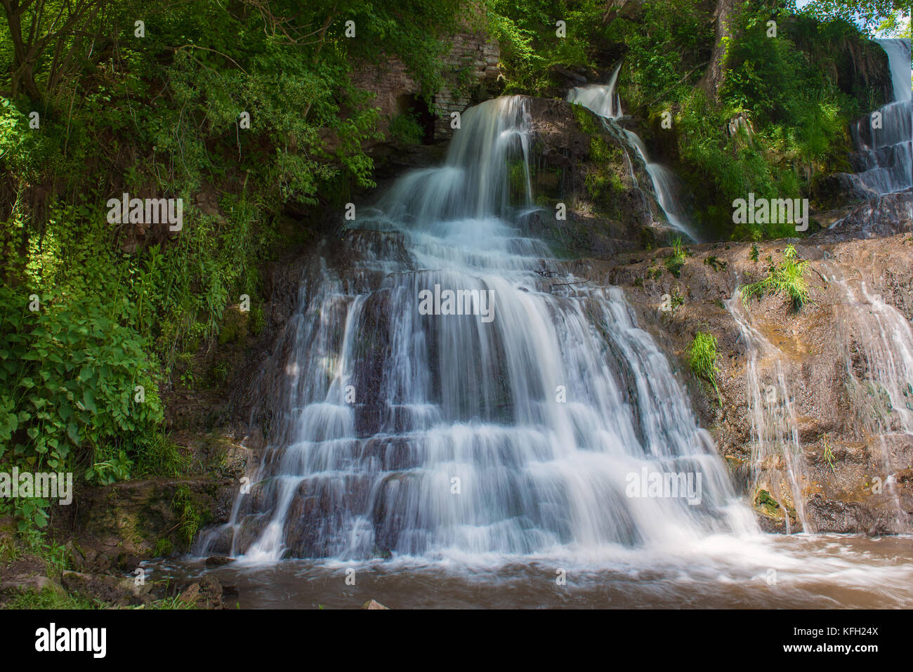 High mountain waterfall Stock Photo - Alamy