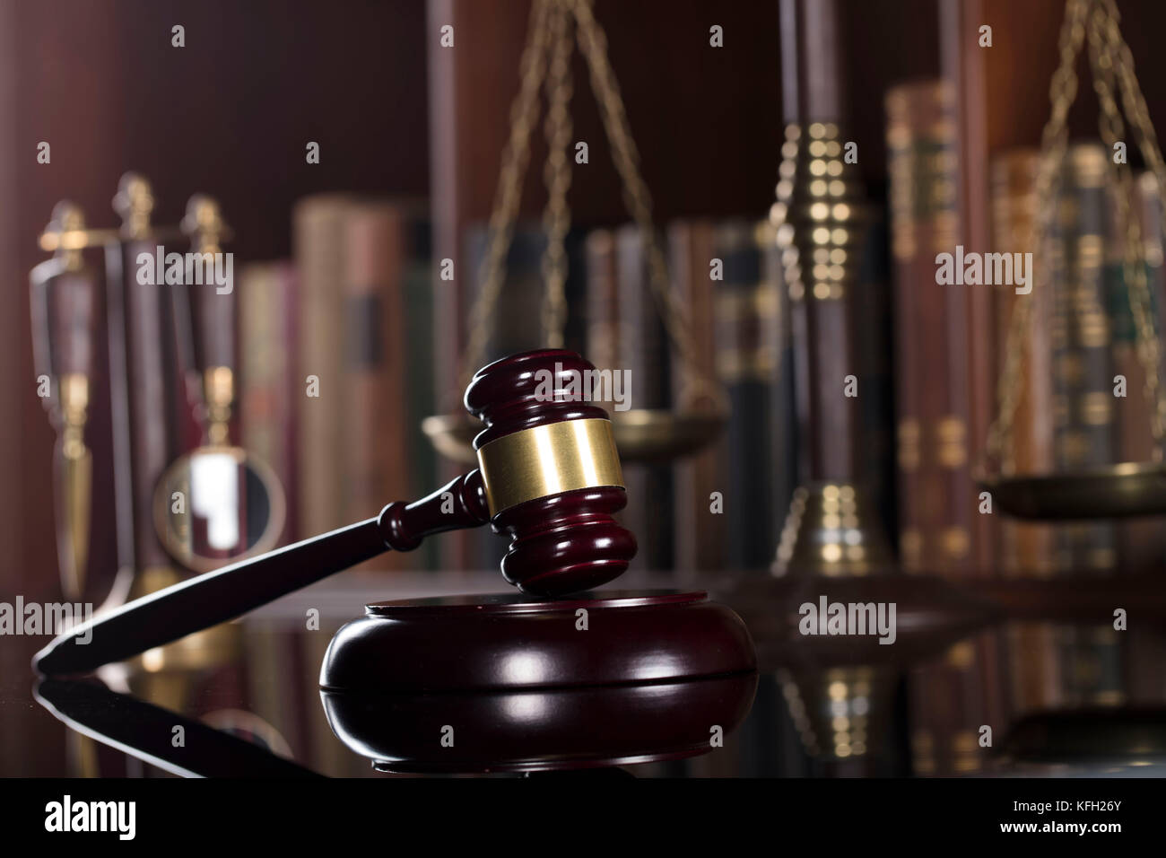 Law theme. Court library. Gavel of the judge and scale of justice Stock ...