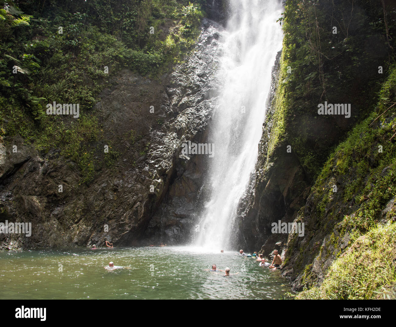 SUVA,VITI LEVU,FIJI-NOVEMBER 28,2016: People enjoying waterfall swim in ...