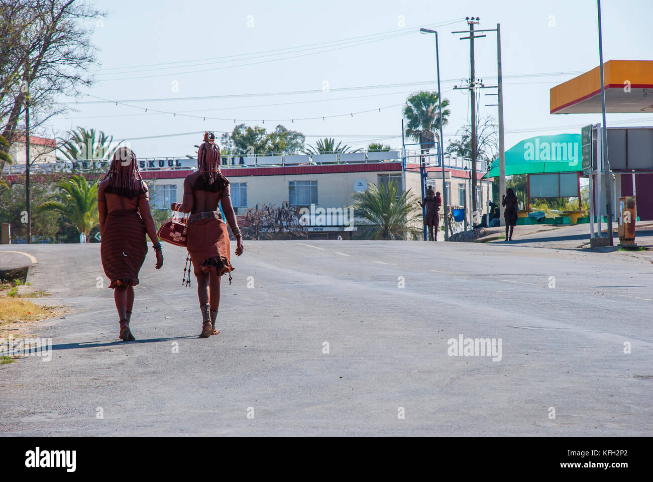 Himba womans walking on the streets of Outjo town, Namibia Stock Photo ...
