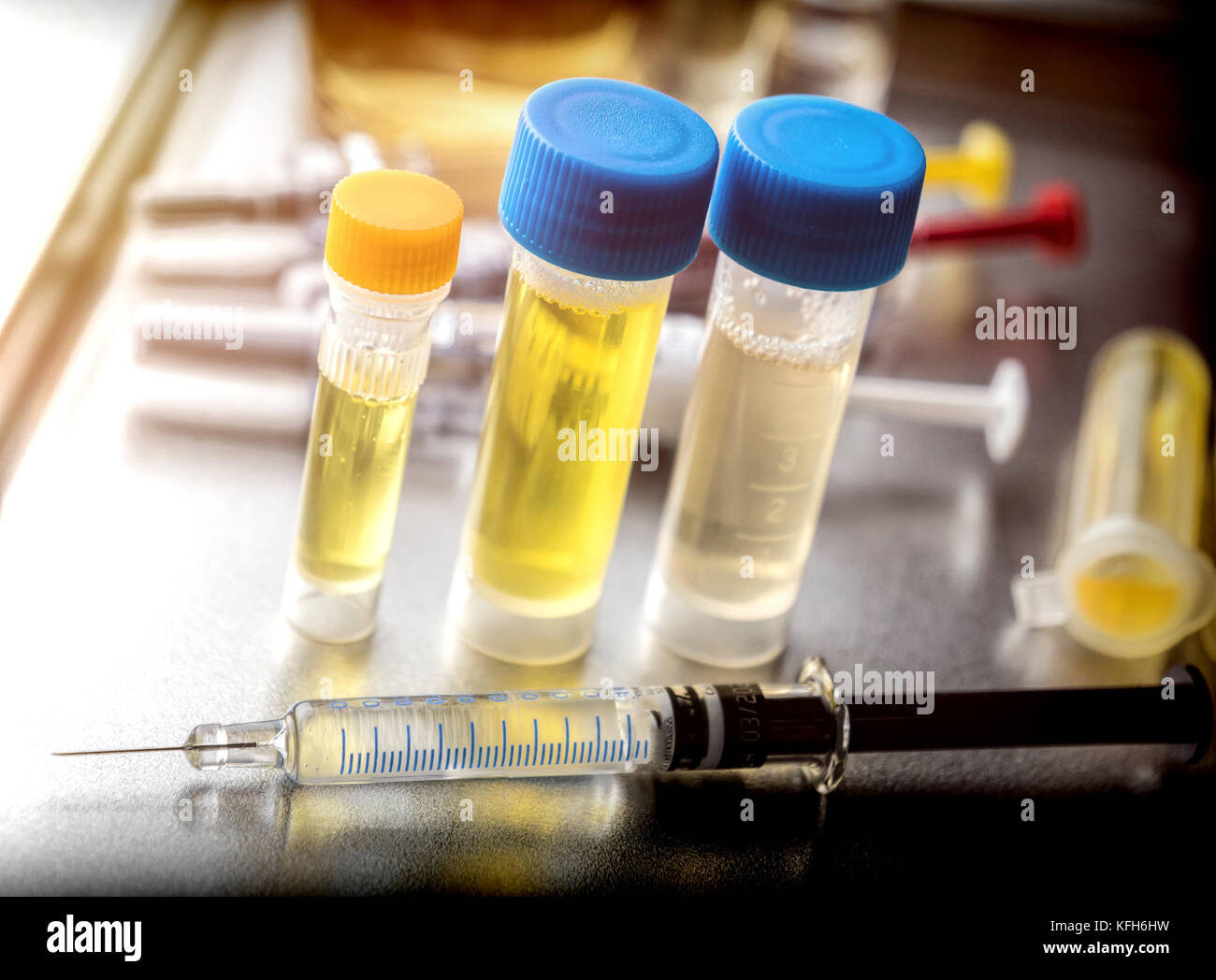 Several Vials And Syringe In Laboratory, Conceptual Image Stock Photo - Alamy