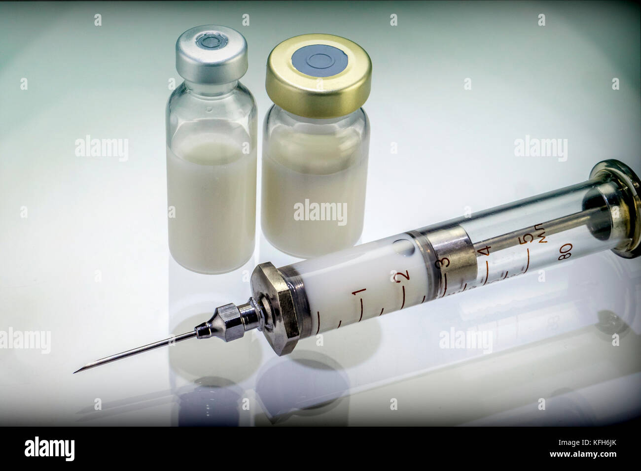 Several Vials And Syringe In Laboratory, Conceptual Image Stock Photo - Alamy
