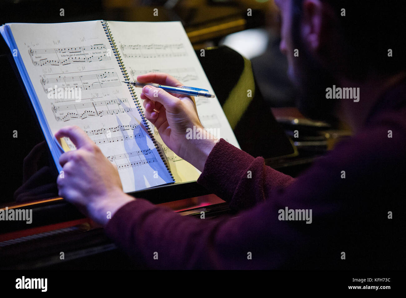 a musician writing sheet music Stock Photo - Alamy