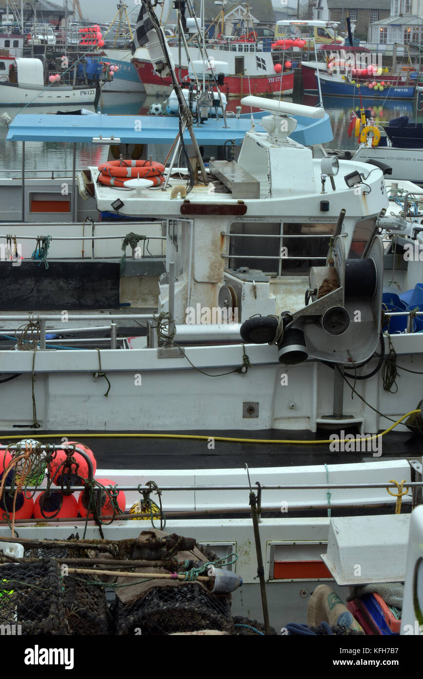 Fishing boats in a crowded and packed harbour at Padstow docks in north ...