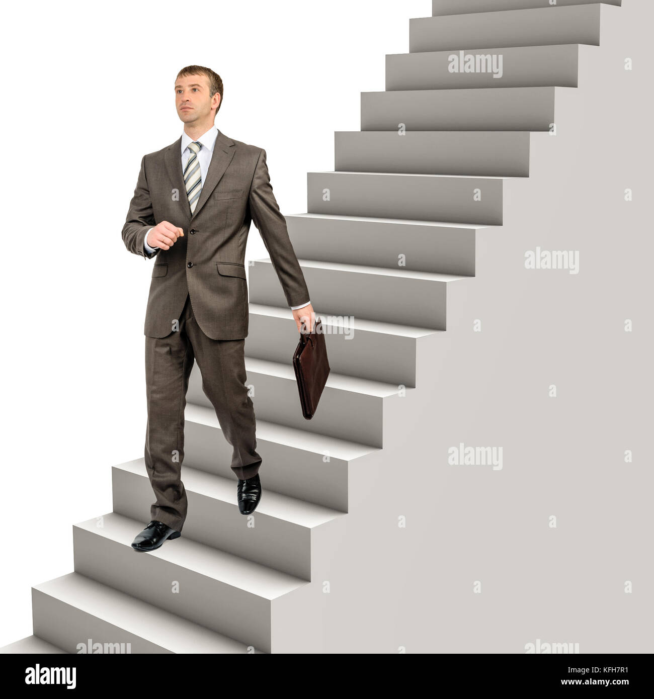 Businessman in formal wear walking down steps Stock Photo - Alamy