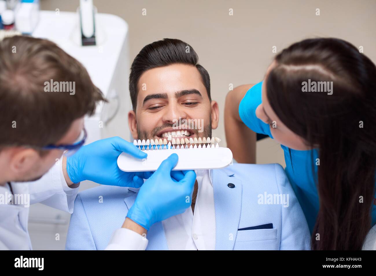 Young man visiting dentist Stock Photo - Alamy