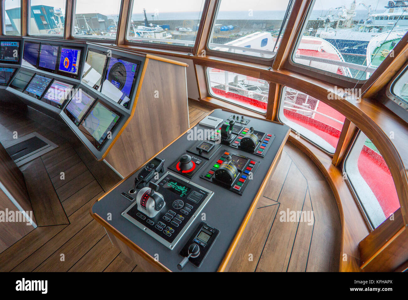 Sophisticated electronic navigation equipment on the bridge of the new ...