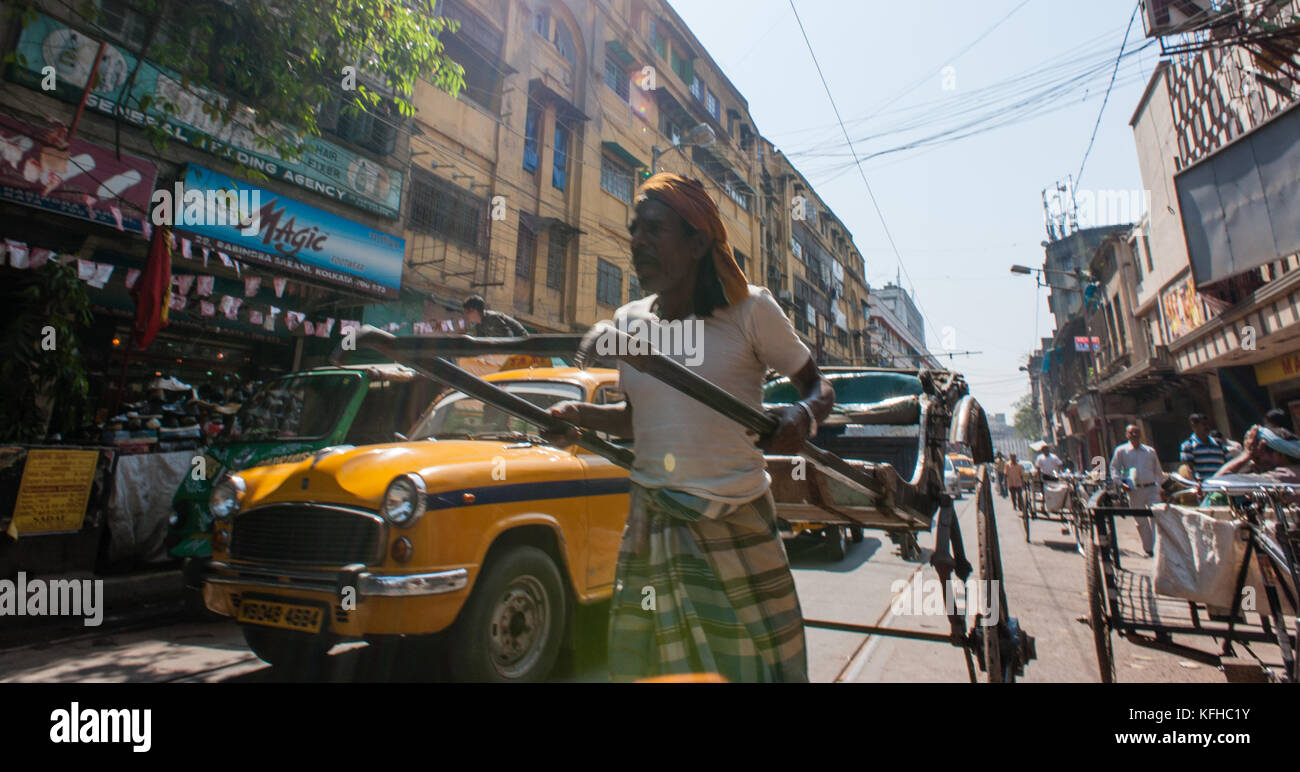 Man pulling rickshaw hi-res stock photography and images - Alamy